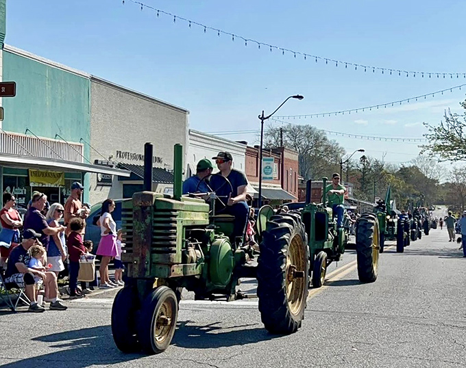 Nothing says small-town pride like a tractor parade rolling down Main Street in vintage green glory.