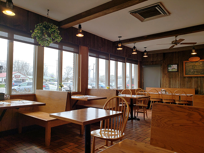 Wooden tables bathed in natural light create the perfect backdrop for unhurried meals. This room has witnessed countless "remember whens" and "you won't believes."