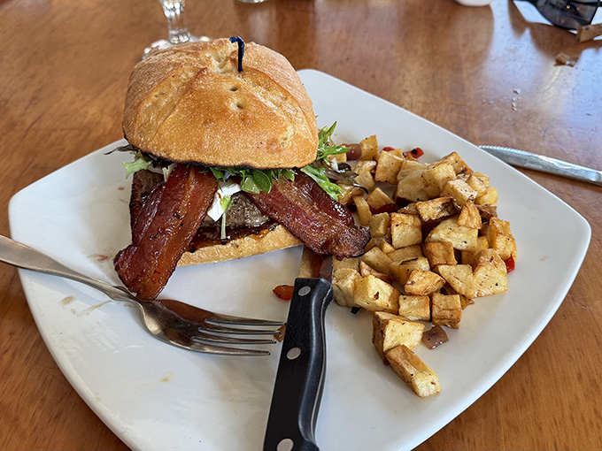 This burger isn't messing around. Those bacon strips aren't just toppings&mdash;they're making a statement about commitment to flavor.