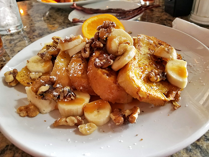 French toast that doesn't just satisfy hunger—it creates happiness. Bananas, walnuts, and maple syrup form a breakfast holy trinity.