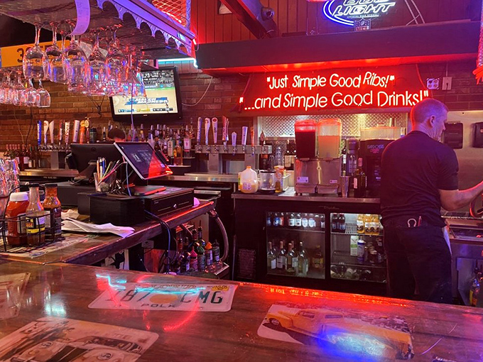 The bar at Manny's isn't just serving drinks—it's dispensing liquid courage for those about to face a 32-ounce porterhouse. "Simple Good Food" indeed.