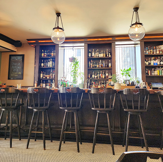 The bar at Heritage Tavern isn't just where drinks are served&mdash;it's where Madison's cocktail dreams come true under globe lights and careful hands.