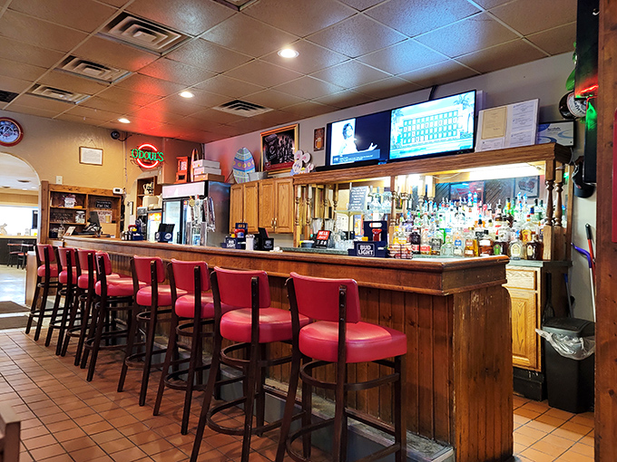 The bar area: where locals gather to debate important matters like basketball rankings and who makes the best tenderloin in three counties.