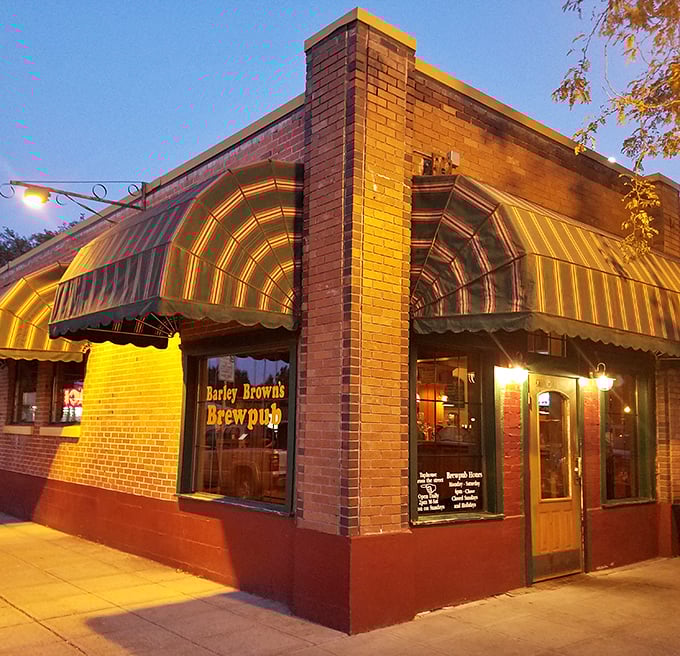 Barley Brown's warm glow at dusk beckons like a lighthouse guiding ships to a harbor of affordable craft beer excellence.
