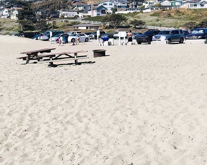 Where cars become beach furniture and parking spaces offer million-dollar views at bargain basement prices.