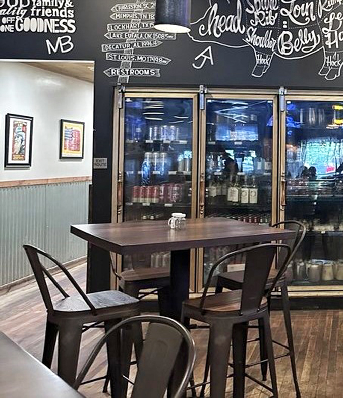 A chalkboard wall maps out barbecue's greatest hits while refrigerator doors promise cold refreshment &ndash; the barbecue equivalent of "you had me at hello."