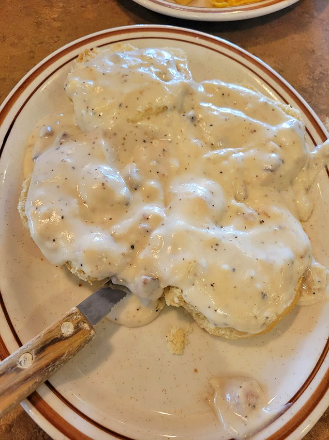 Biscuits and gravy that would make your Southern grandmother nod in approval. This plate of peppery, creamy comfort is breakfast nirvana.