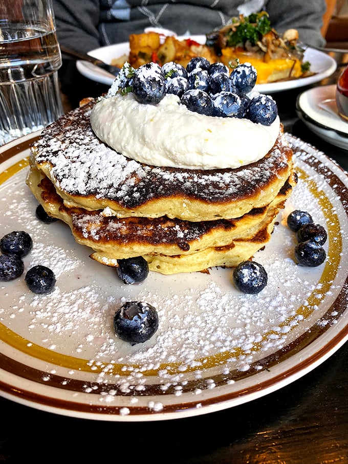 Blueberry cream cheese pancakes that make ordinary mornings feel like special occasion weekend brunches.