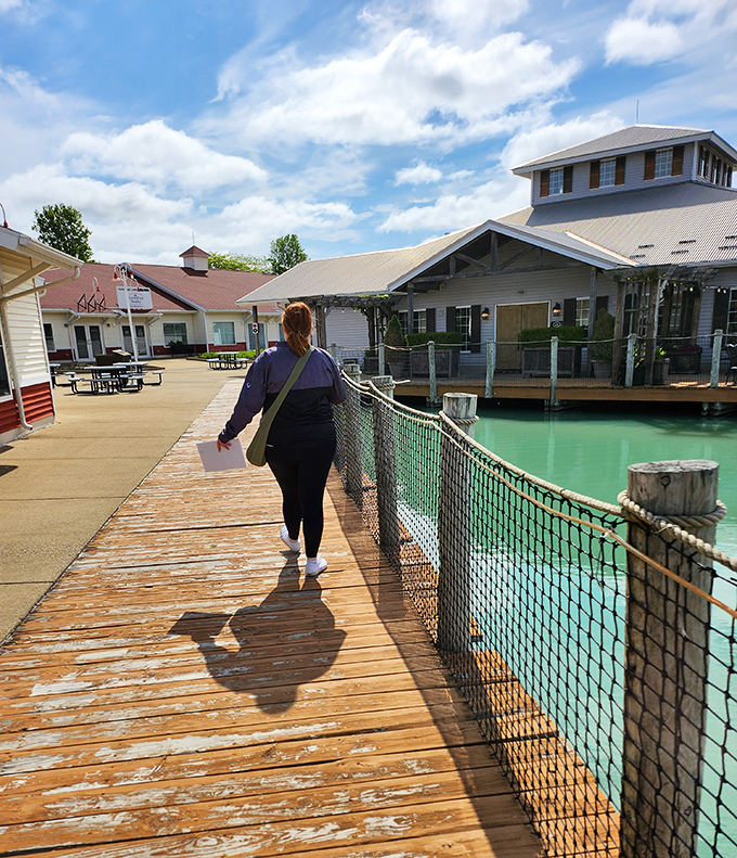 The weathered boardwalk tells stories of countless shopping expeditions, leading visitors from one waterfront treasure to the next.