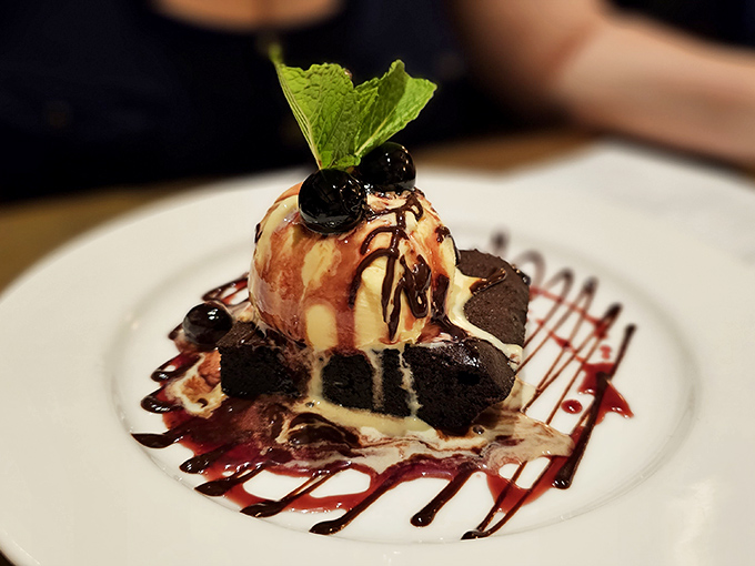 This brownie à la mode creates the perfect temperature tango—hot meets cold in a dessert that justifies saving room. Worth every calorie.