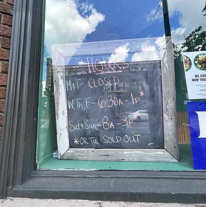 The hours sign with its asterisked "OR TIL SOLD OUT" warning tells you everything about their popularity&mdash;arrive early or prepare for disappointment.