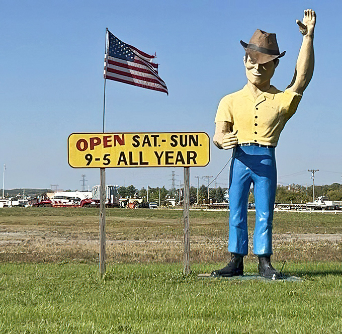 The friendly giant cowboy stands eternal watch, waving hello while reminding you of weekend hours&mdash;Ohio's own retail Paul Bunyan.