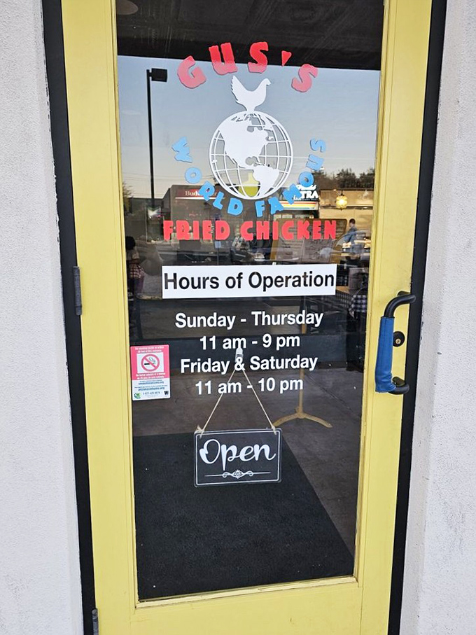 The yellow door frame – a portal to flavor town. Those hours of operation are basically your weekly schedule now.