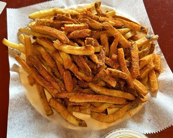 Cajun fries with attitude&mdash;crispy, seasoned soldiers that march straight from the fryer to your heart. Diet plans surrender at first bite.