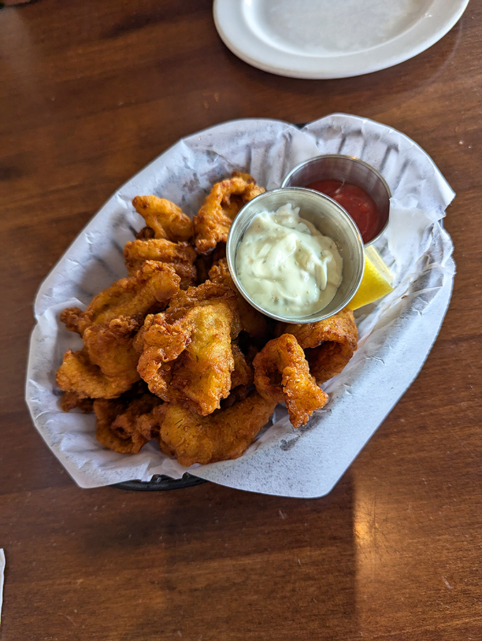 Calamari that defies the rubbery reputation of lesser versions&mdash;golden, tender morsels that disappear faster than you can say "more, please."