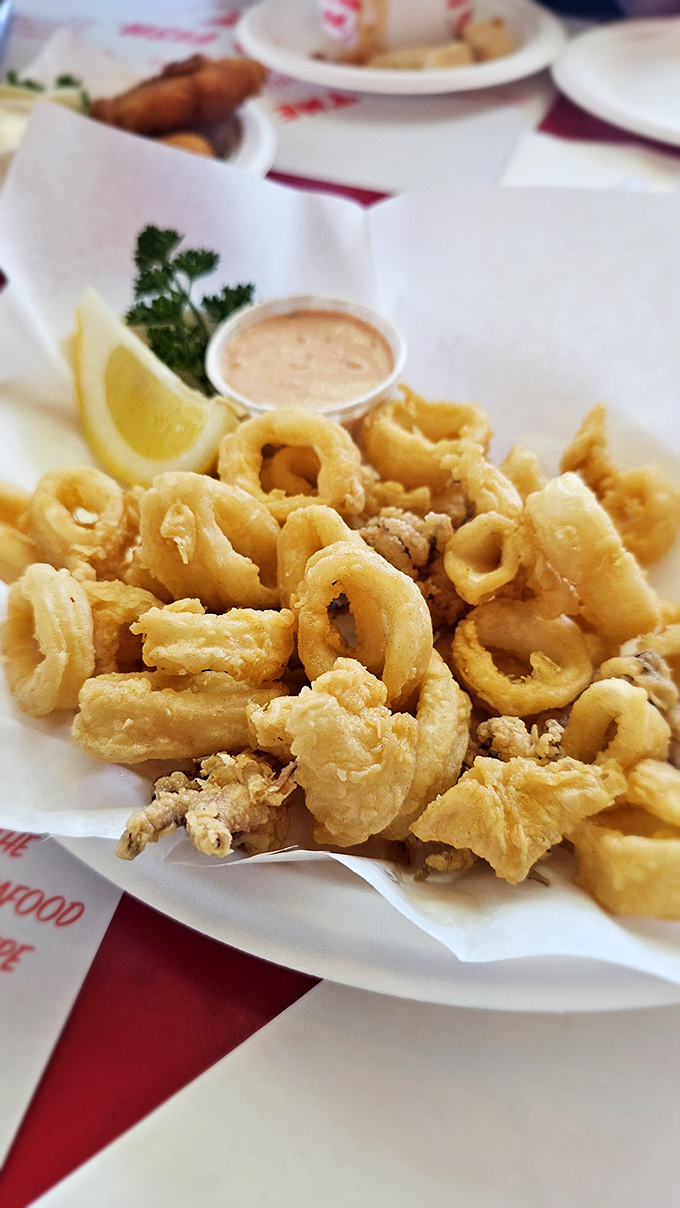 Calamari that doesn't fight back &ndash; tender, golden rings that make you wonder why anyone would ever use the word "rubbery" near squid.