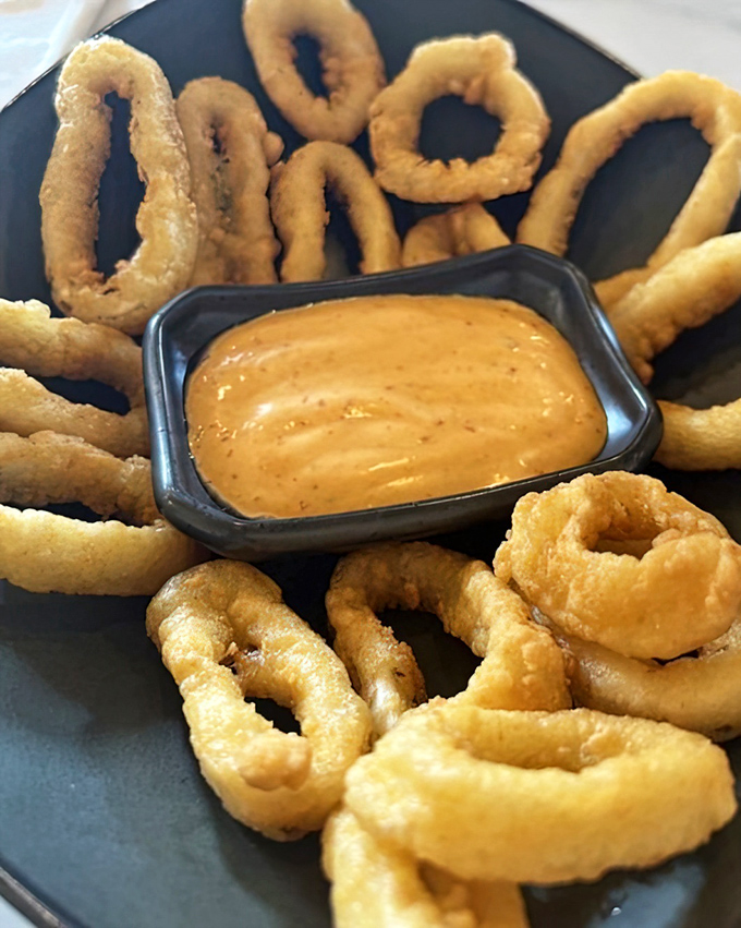 Calamari rings so perfectly golden and crisp, they make you wonder why you ever settled for less elsewhere.