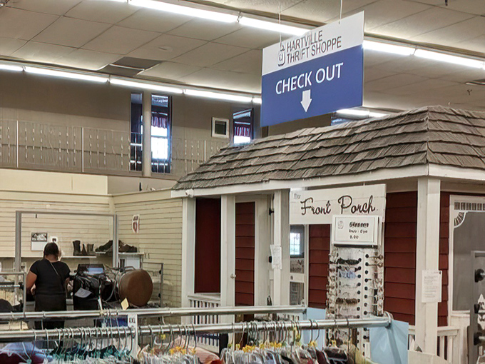 Even the checkout area has character with its charming "Front Porch" design. A fitting final stop on your treasure-hunting expedition through this remarkable thrift destination.