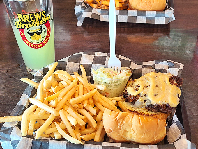 A perfect trifecta: golden fries, creamy coleslaw, and a burger that makes you want to write poetry. Lunch doesn't get better than this.