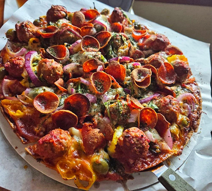 The Chef Surprise isn't just a pizza &ndash; it's a colorful canvas of culinary creativity where pepperoni curls like little flavor scrolls among the sausage landscape.