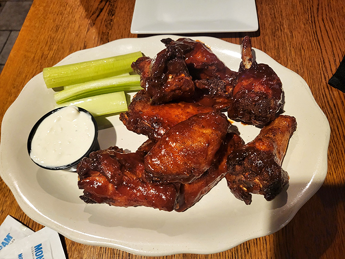 These wings aren't messing around&mdash;glazed to perfection, served with cooling celery and dip, they're the kind of messy indulgence worth every napkin.