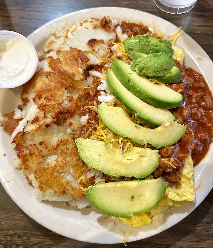 Just when you thought omelets couldn't get more exciting, along comes this chili-topped creation with avocado. Breakfast and lunch having a delicious identity crisis.
