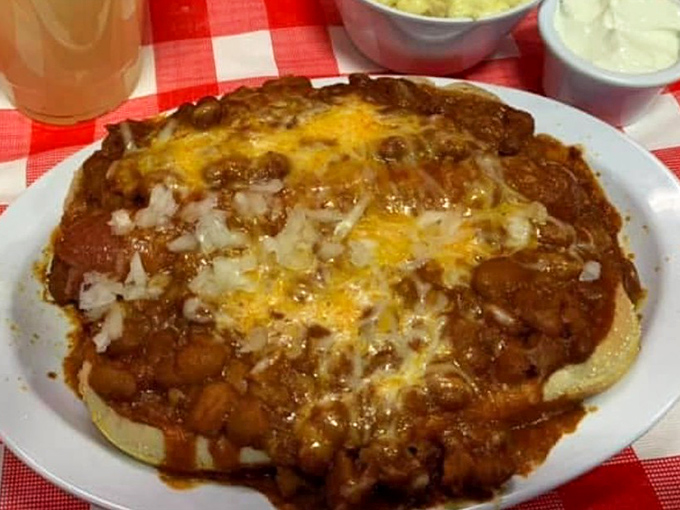 Chili cheese dog that would make a cardiologist wince and a food lover weep with joy. Worth every napkin you'll need afterward.