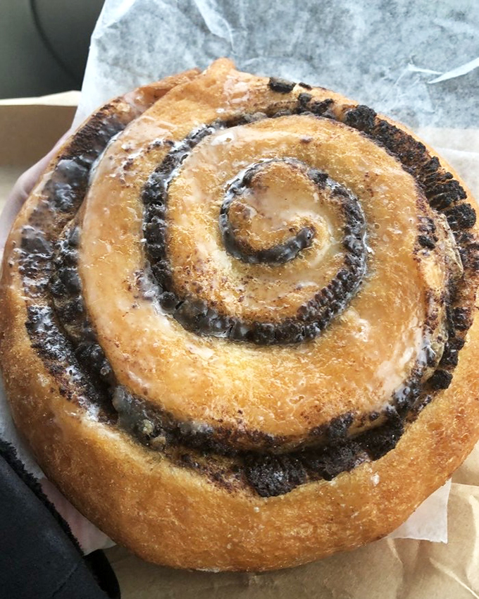 The cinnamon roll&mdash;a spiral galaxy of buttery dough and spice. Its gravitational pull is impossible to resist, drawing you into its sweet orbit.