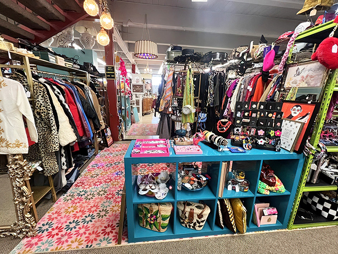The vintage clothing section explodes with color and pattern, where yesterday's fashion statements become tomorrow's unique style, all displayed on a flower-power carpet.