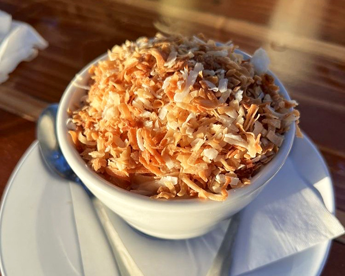Coconut cake that's light as air but rich as Midas. The toasted coconut on top isn't decoration&mdash;it's the crown this royal dessert deserves. 