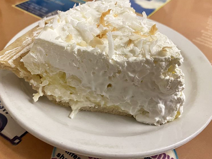 Coconut cream pie that's more cloud than dessert, with a meringue topping that would make angels jealous of our earthly delights.