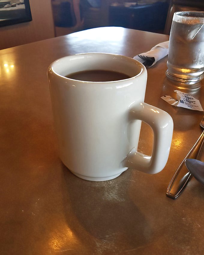 The humble diner coffee mug&mdash;unassuming yet mighty, ready to fuel desert adventures or just good conversation.
