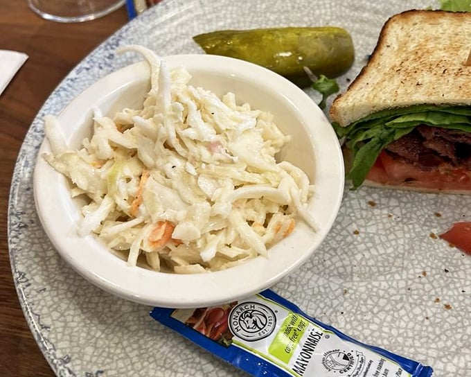 The humble coleslaw, often overlooked, here becomes the perfect tangy counterpoint to a sandwich, proving that sometimes the supporting actors steal the show.