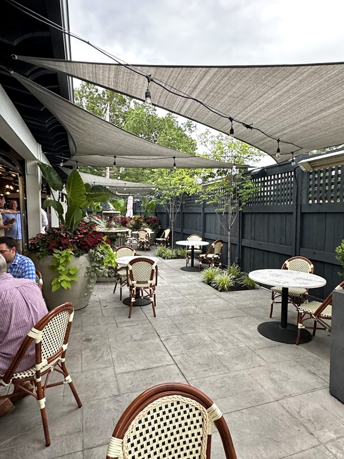 The courtyard offers al fresco dining under canvas sails, where summer evenings stretch as long as the cocktail menu.