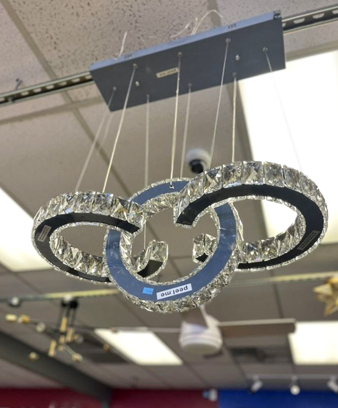A crystal chandelier that probably illuminated someone's grand foyer now dangles with possibility&mdash;glamour at thrift store prices is the ultimate luxury.