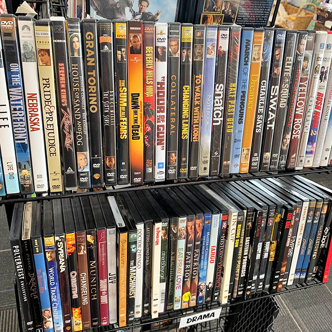 The DVD section&mdash;a nostalgic time capsule where "Chariots of Fire" sits beside "Shrek," waiting for movie night resurrection.