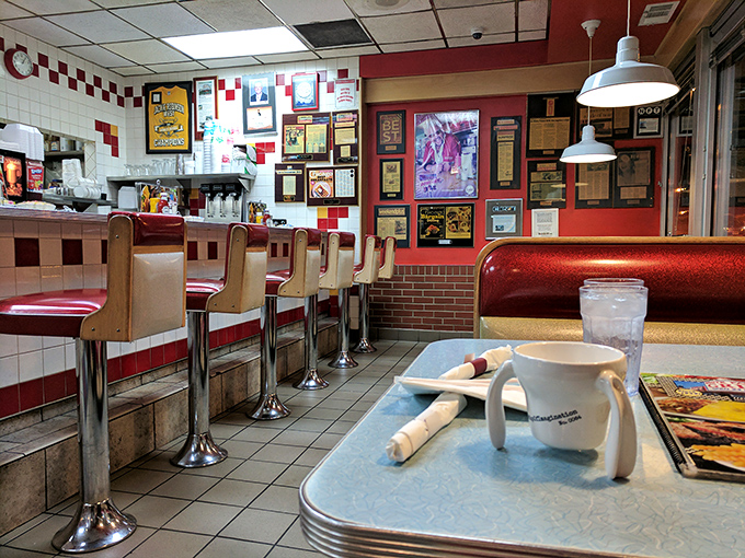 The counter seats &ndash; where regulars perch like birds on a wire, watching the morning unfold over steaming mugs of coffee.