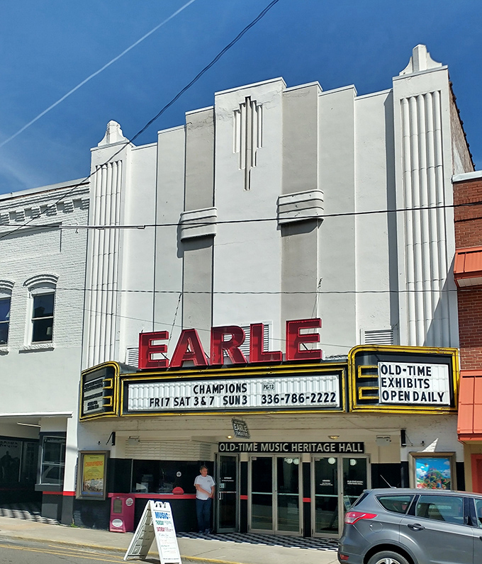 The Earle Theatre's art deco facade promises entertainment the way theaters used to deliver it.