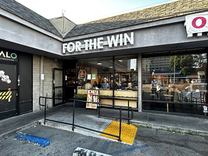 The entrance that doesn't prepare you for the flavor explosion waiting inside. Like finding a secret doorway to burger paradise.