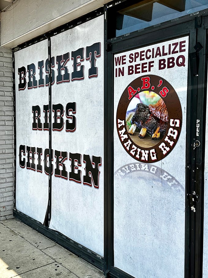 The entrance tells you exactly what you need to know&mdash;brisket, ribs, chicken, and a promise of "amazing" that isn't just marketing, but a solemn vow.