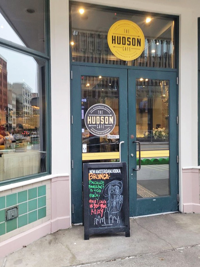 The welcoming entrance promises brunch adventures within&mdash;complete with a chalkboard sign that might as well say "Happiness Served Daily."