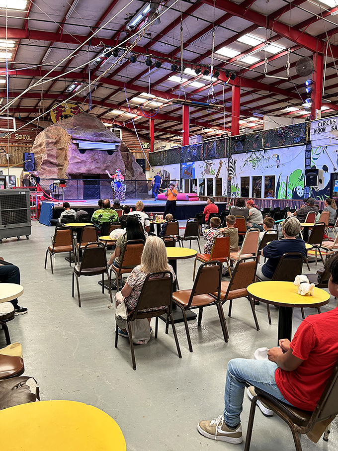 Dinner and a show, flea market style! Nothing says "cultural experience" like watching clowns perform while sitting at cafeteria tables that have seen better decades.