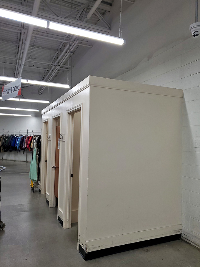 Fitting rooms await the hopeful, where the universal question "Does this still fit?" gets answered with brutal honesty.