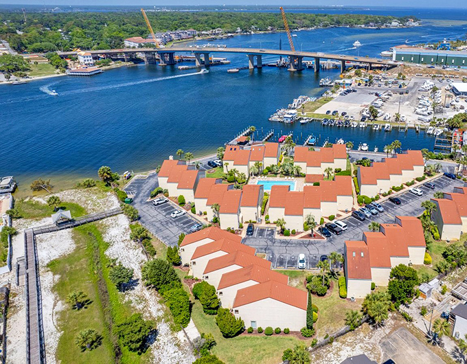 Waterfront condos create a horseshoe of paradise around the marina. Proof that retirement dreams can come with a boat slip and sunset views.
