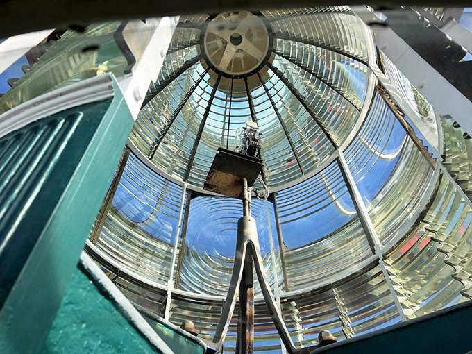 Looking up into the Fresnel lens is like gazing into a crystal cathedral of light, where science and beauty merged to save countless lives.