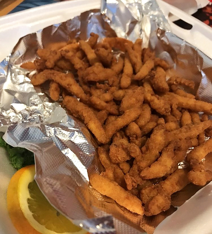 Fried clam strips that crunch like autumn leaves but taste like summer at the shore&mdash;pure nostalgic bliss.