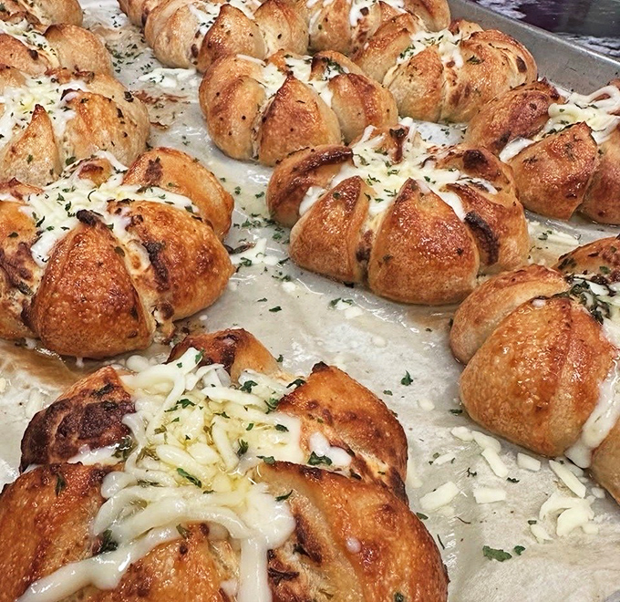 Not just bread: these cheesy, herb-flecked beauties are what garlic knots aspire to be when they grow up.