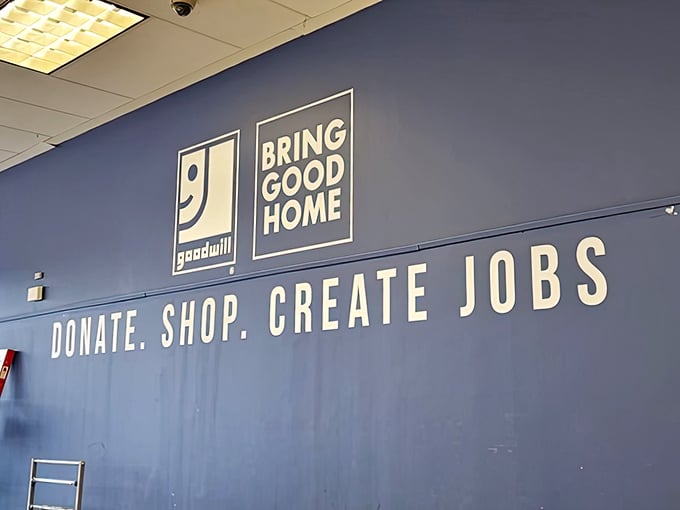 The mission statement wall reminds us that every purchase powers something greater&mdash;turning yesterday's donations into tomorrow's jobs.