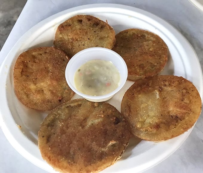 Fried green tomatoes &ndash; the South's gift to the culinary world &ndash; crispy, tangy discs of perfection with a dipping sauce that seals the deal.