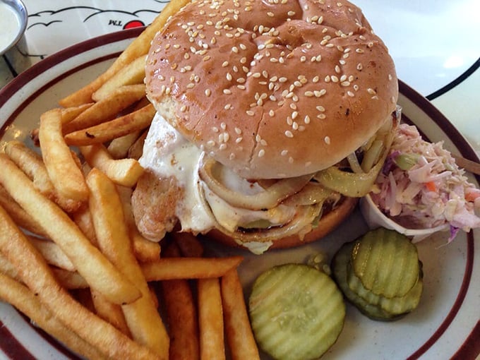 This isn't just a sandwich&mdash;it's a towering achievement of grilled chicken, melted cheese, and fresh veggies that requires both hands and a strategy.